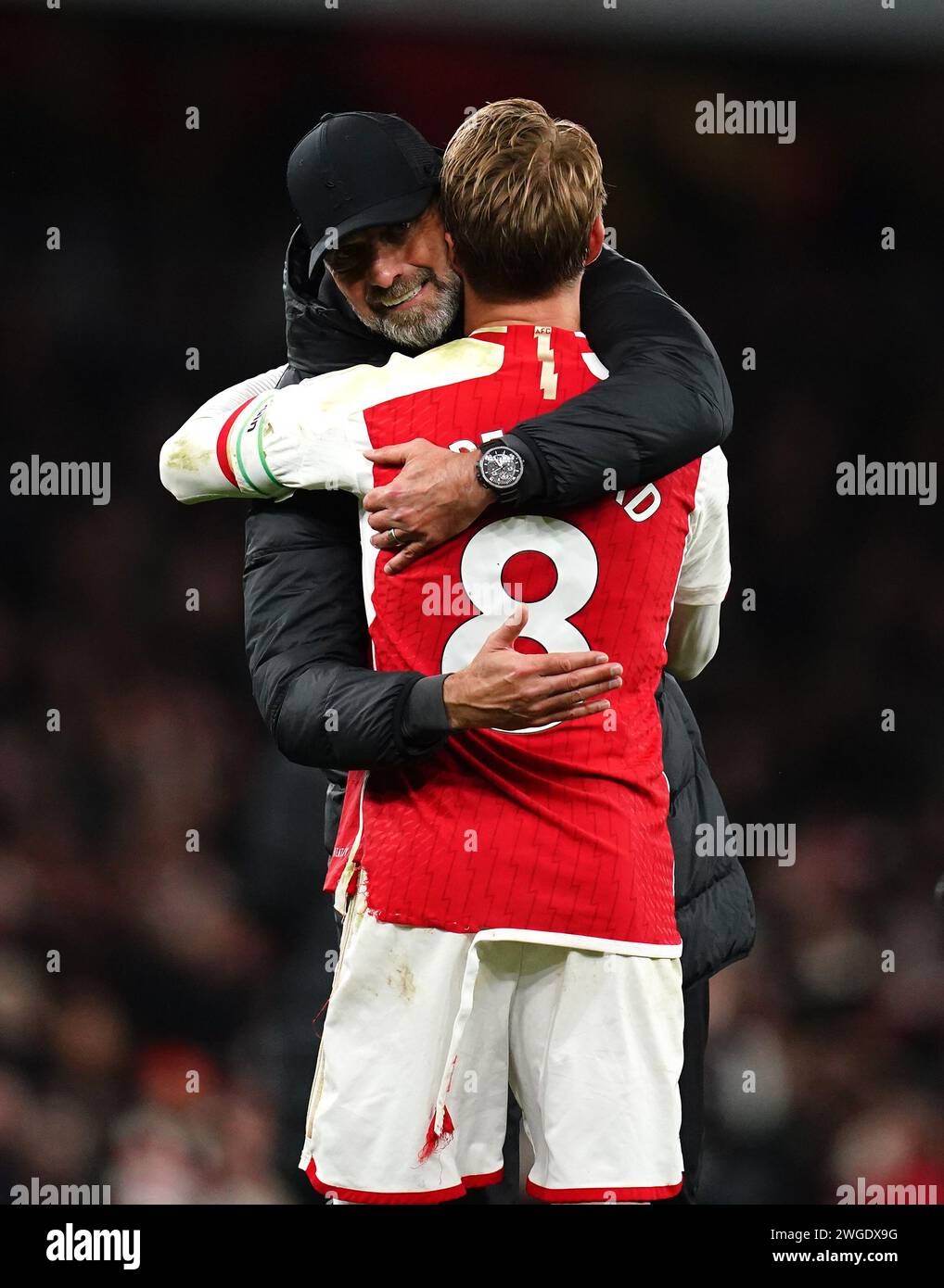 Liverpool manager Jurgen Klopp (left) and Arsenal's Martin Odegaard after the final whistle in ...