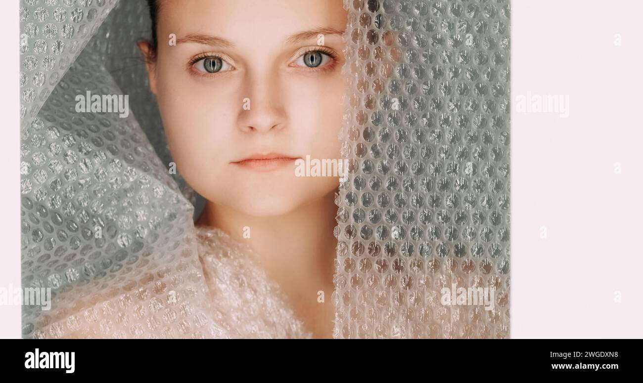 Nature pollution plastic woman bubble wrap light Stock Photo - Alamy