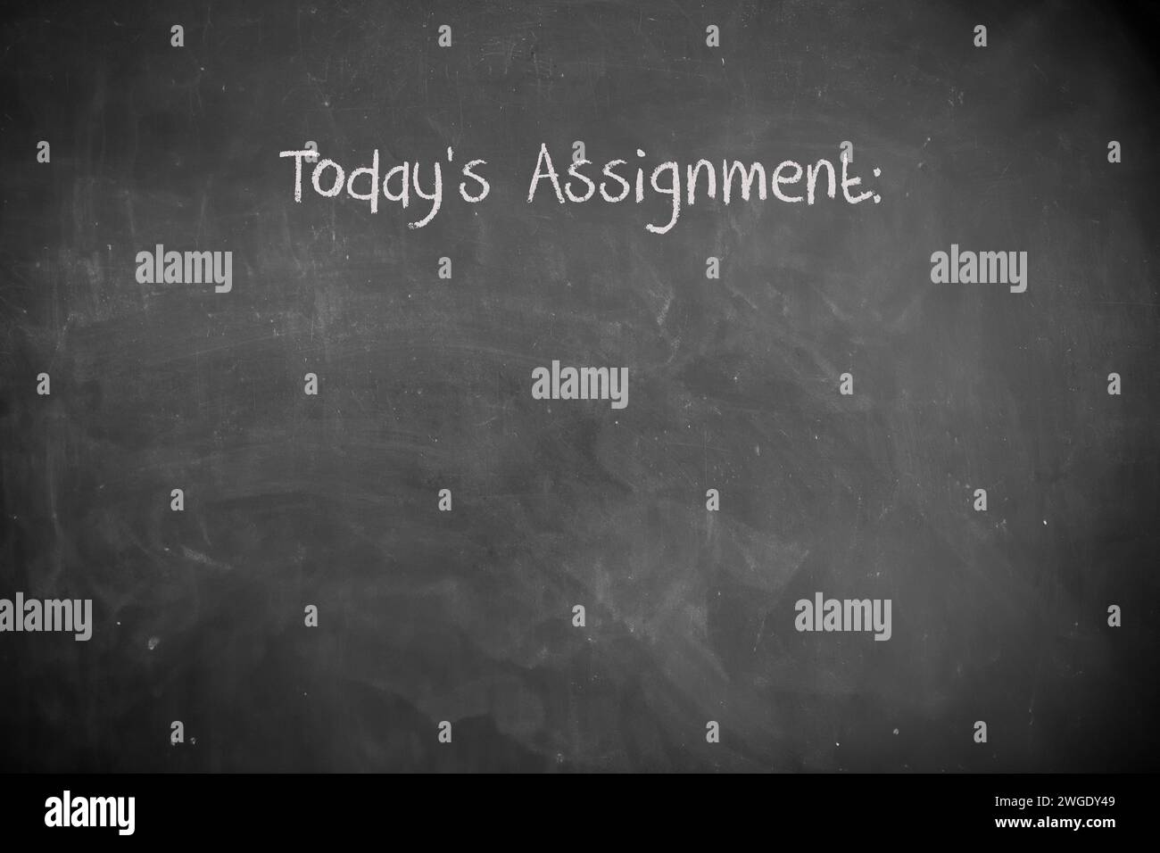 Blackboard with todays assignment written in chalk Stock Photo - Alamy