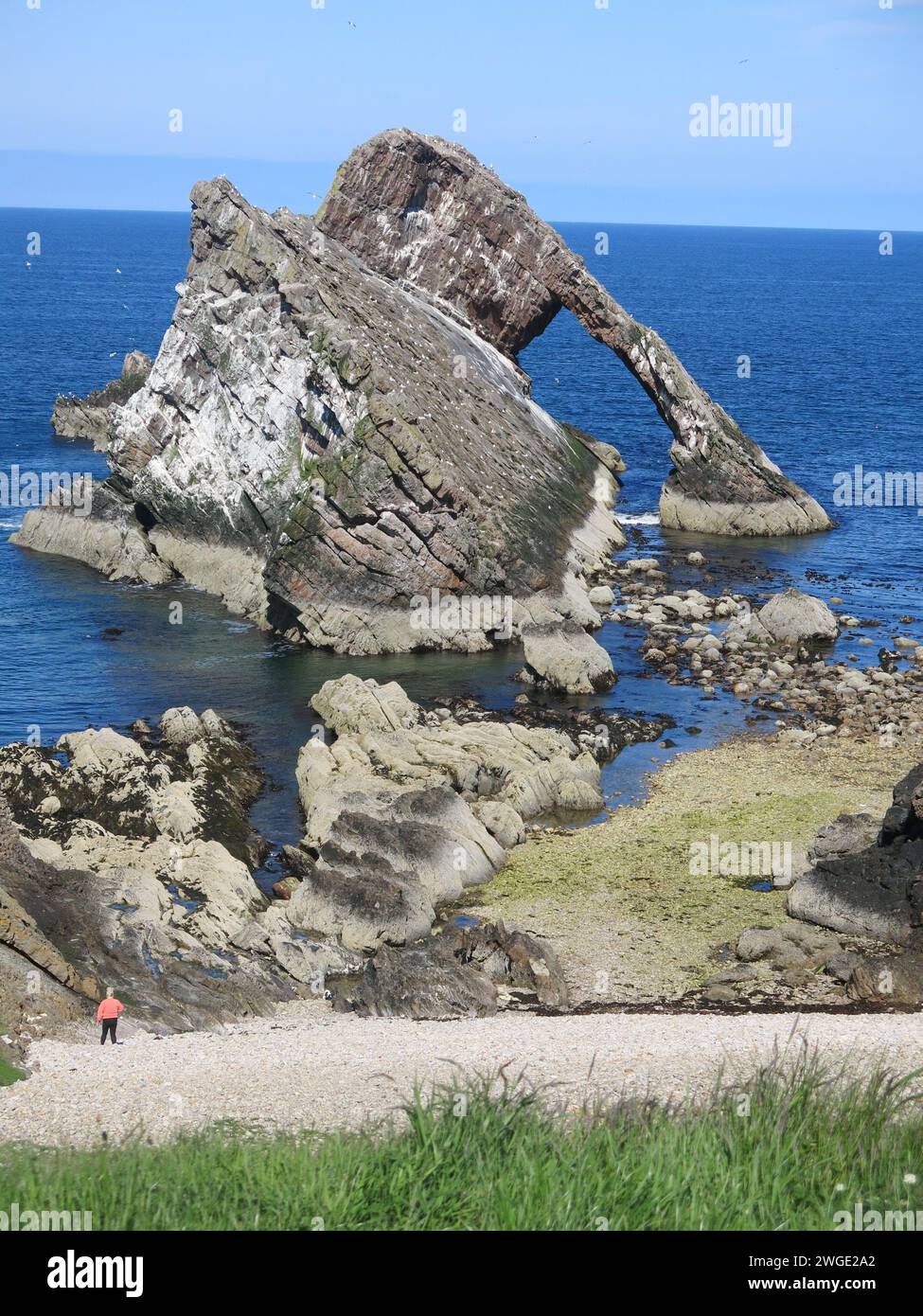 The dramatic scenery of the Moray coastline: Bow Fiddle Rock at ...