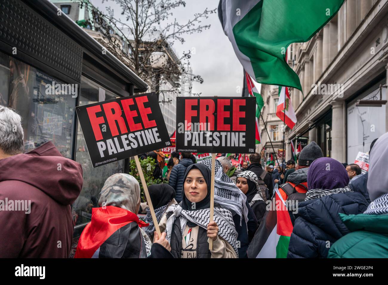 London, UK. 3rd February 2024. Free Palestine banners held by female ...