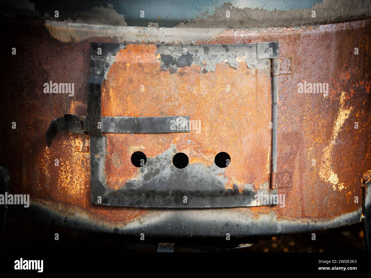 Detail of rustic iron stove Stock Photo - Alamy