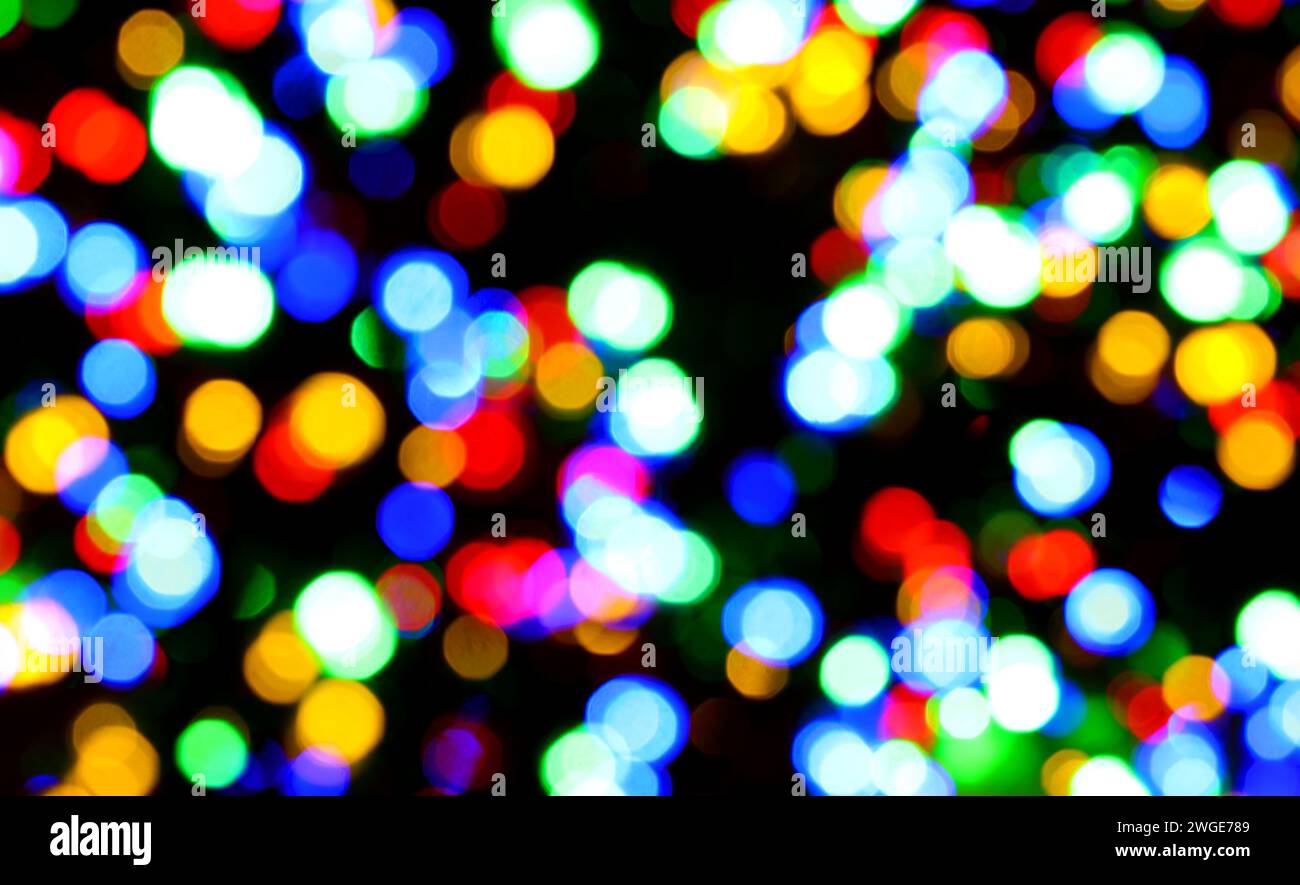 intentionally blurred background of series of illuminated lights of ...