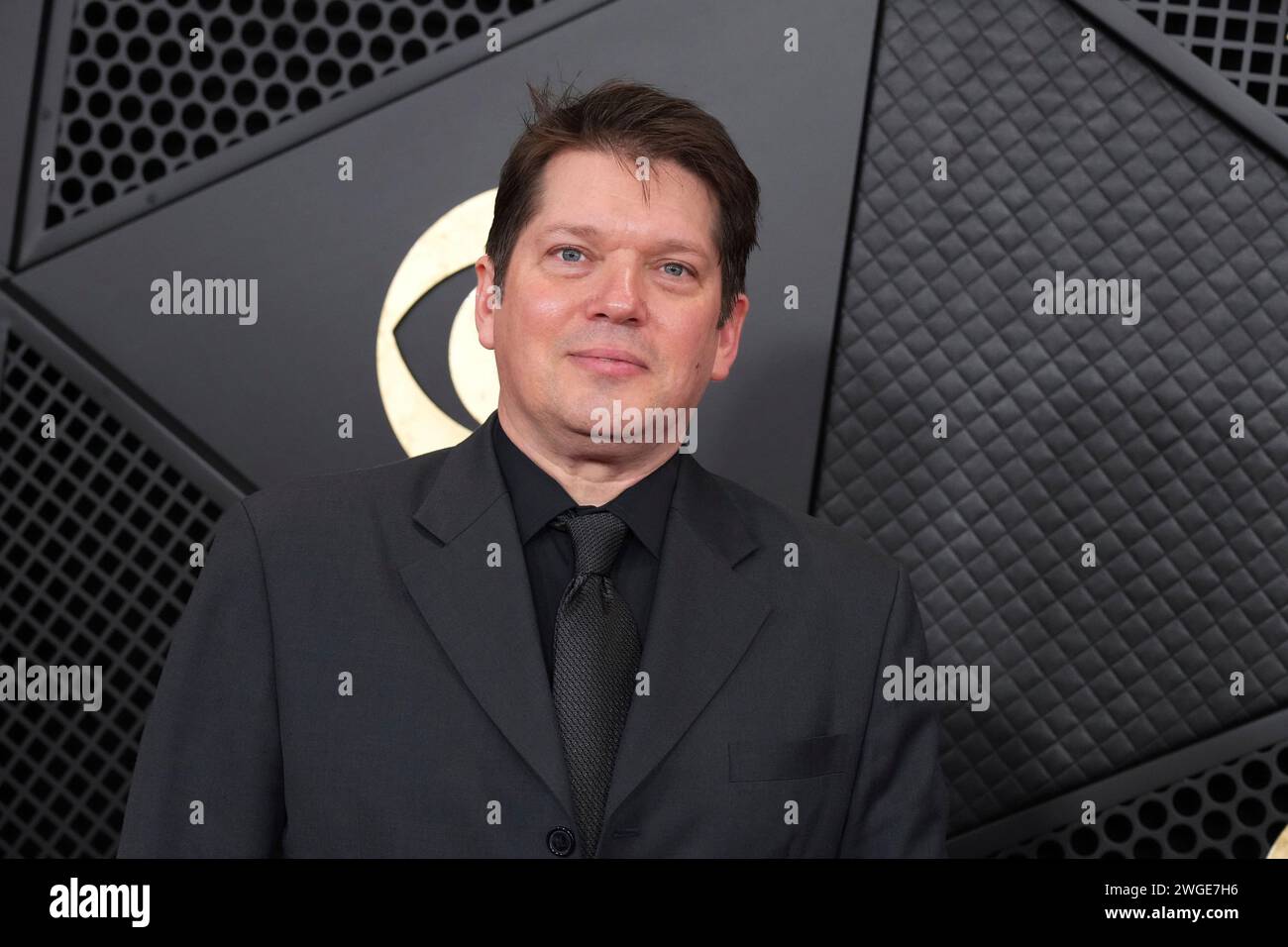 Lawrence Manchester arrives at the 66th annual Grammy Awards on Sunday ...