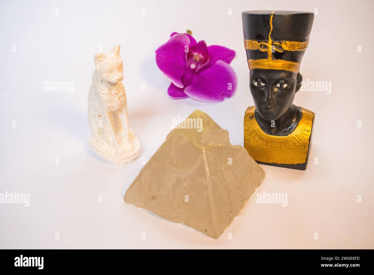 A soft focus of Queen Nefertiti From a pyramid, a cat and an orchid ...