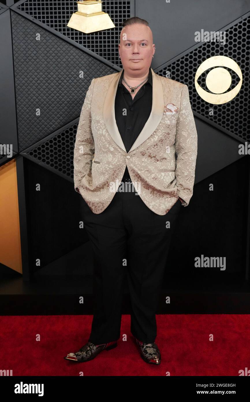 Phil Geoffrey Bond arrives at the 66th annual Grammy Awards on Sunday ...