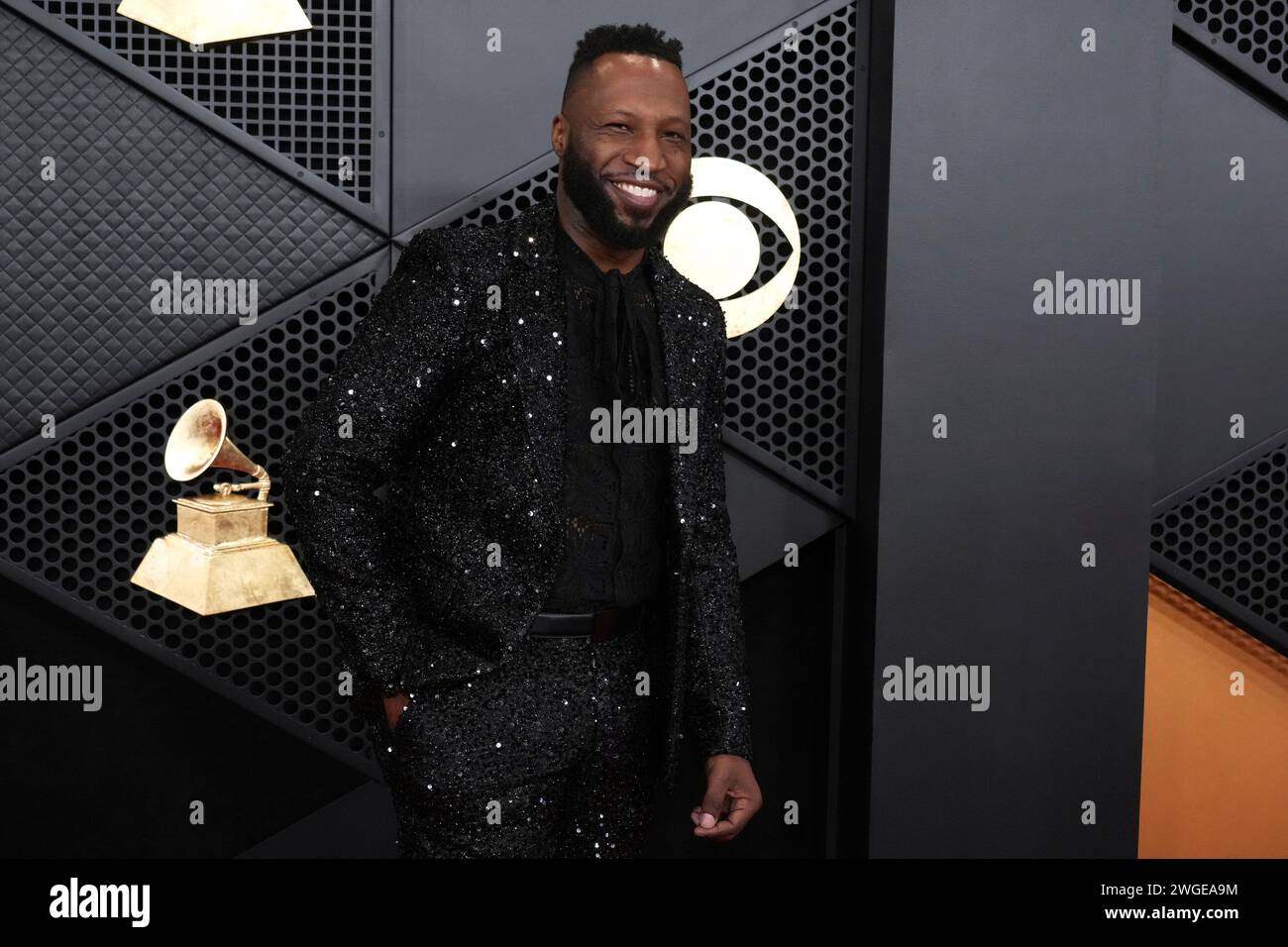 Gary Gerard Hamilton arrives at the 66th annual Grammy Awards on Sunday ...