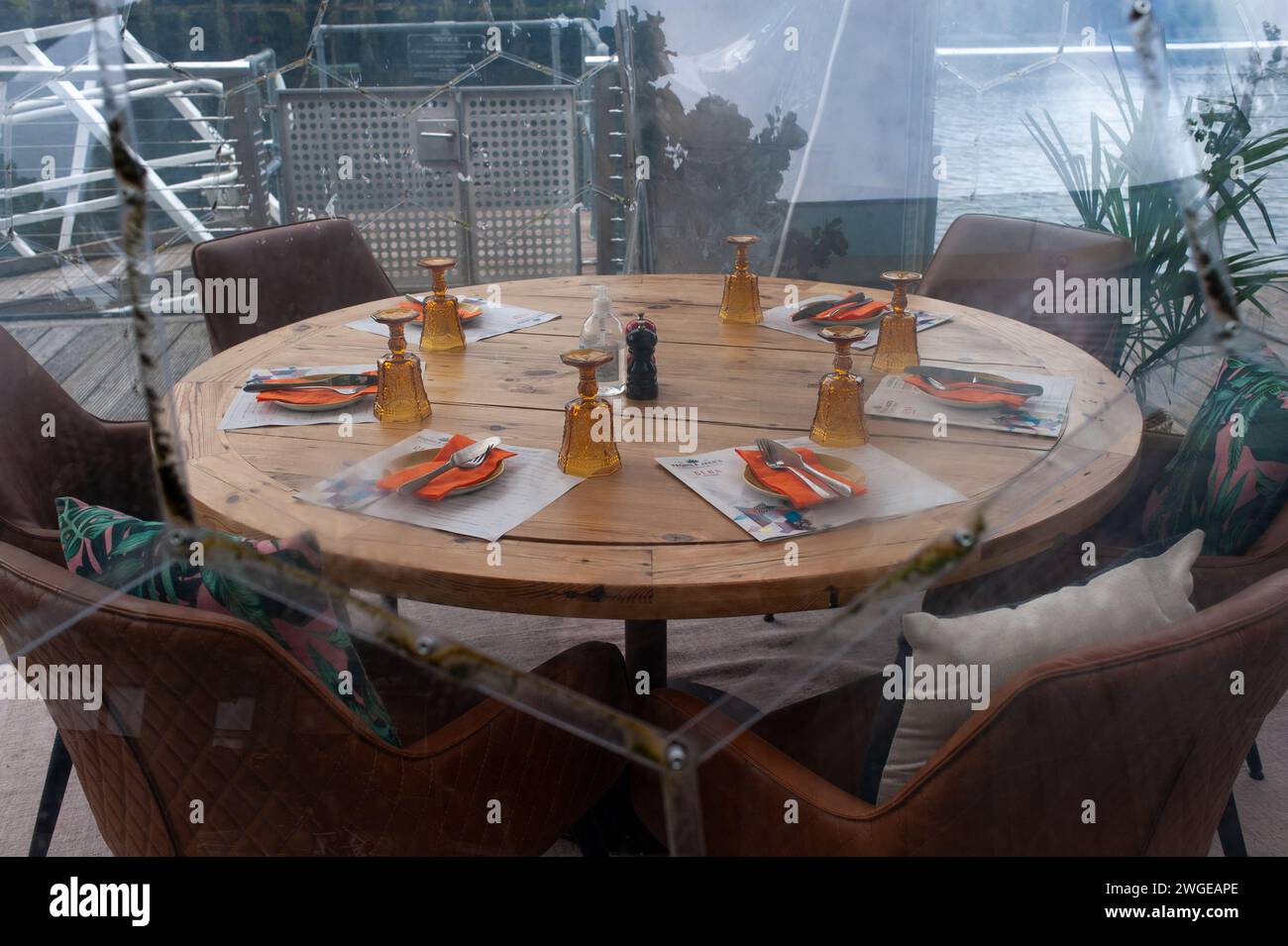 Restaurant tables in domes in Boardwalk Lapps Quay, Cork Stock Photo ...