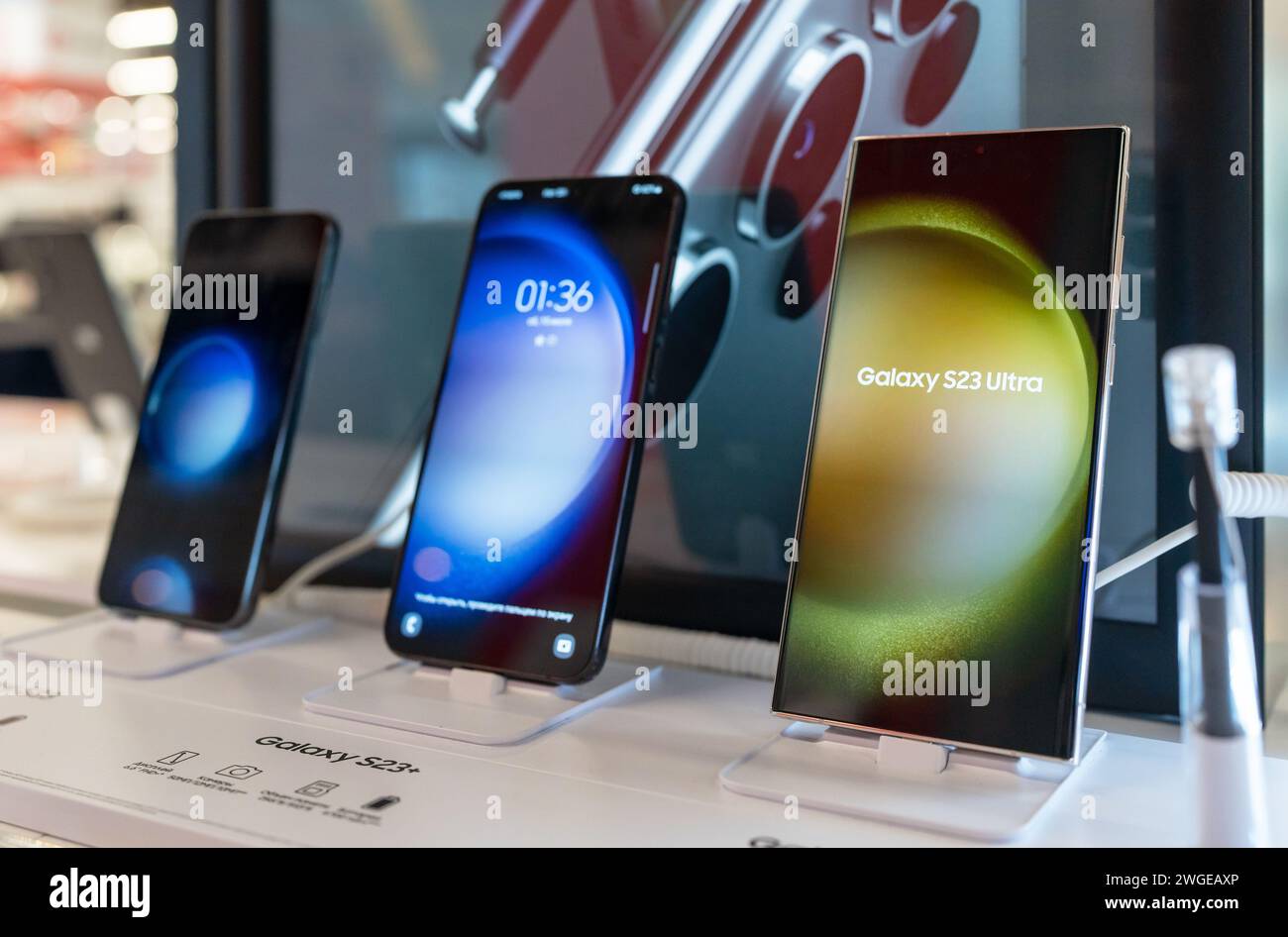 Apple iPhone 14 smartphones models at Apple store. Customers choosing ...