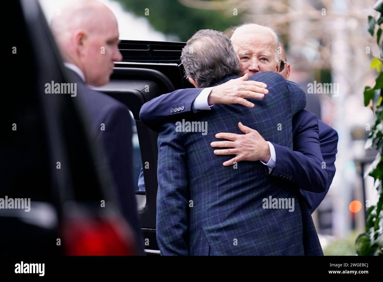 President Joe Biden, right, hugs his son Hunter Biden on Hunter's ...