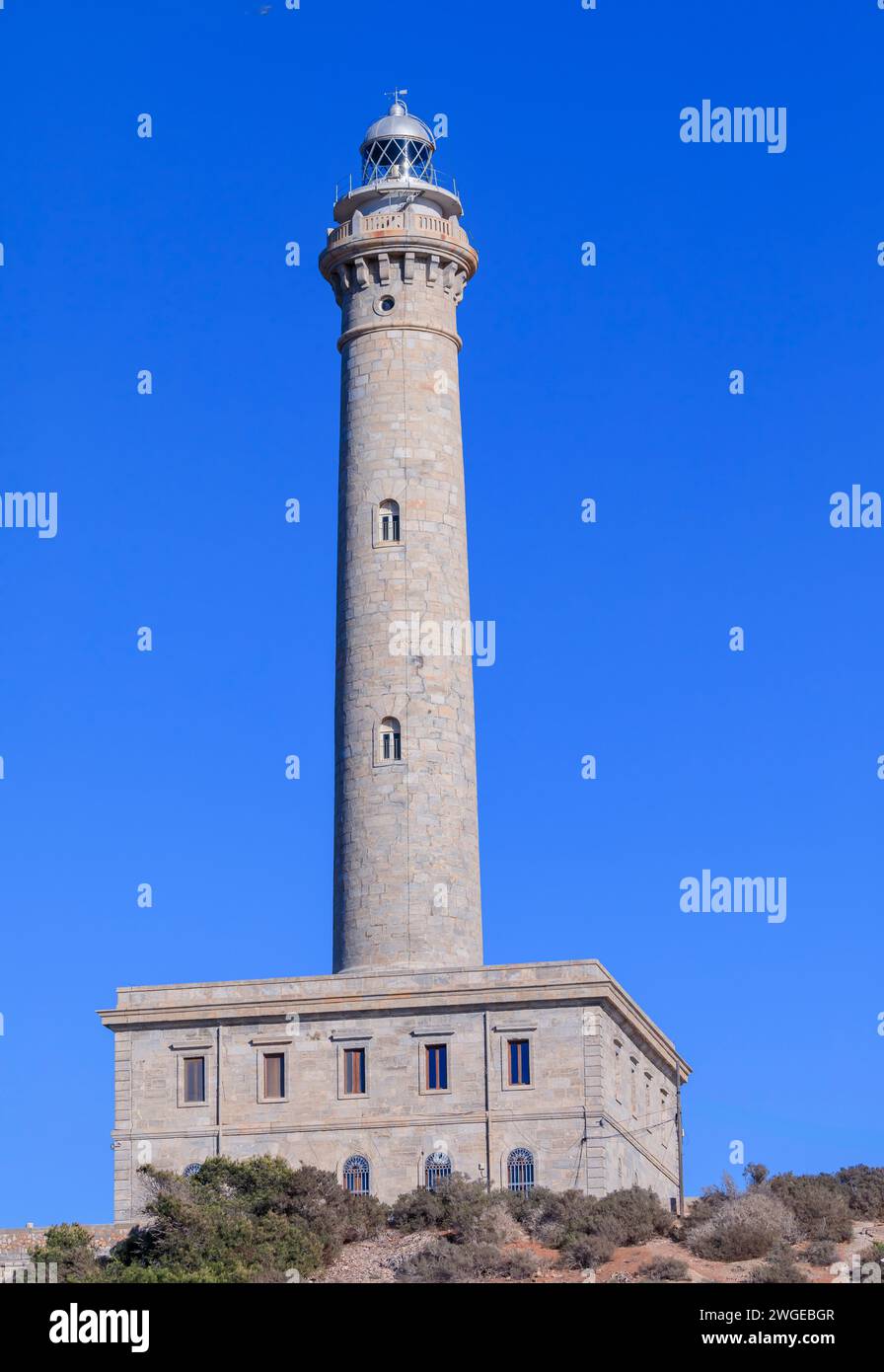 Tall stone built lighthouse on a hill in southern spain Stock Photo - Alamy