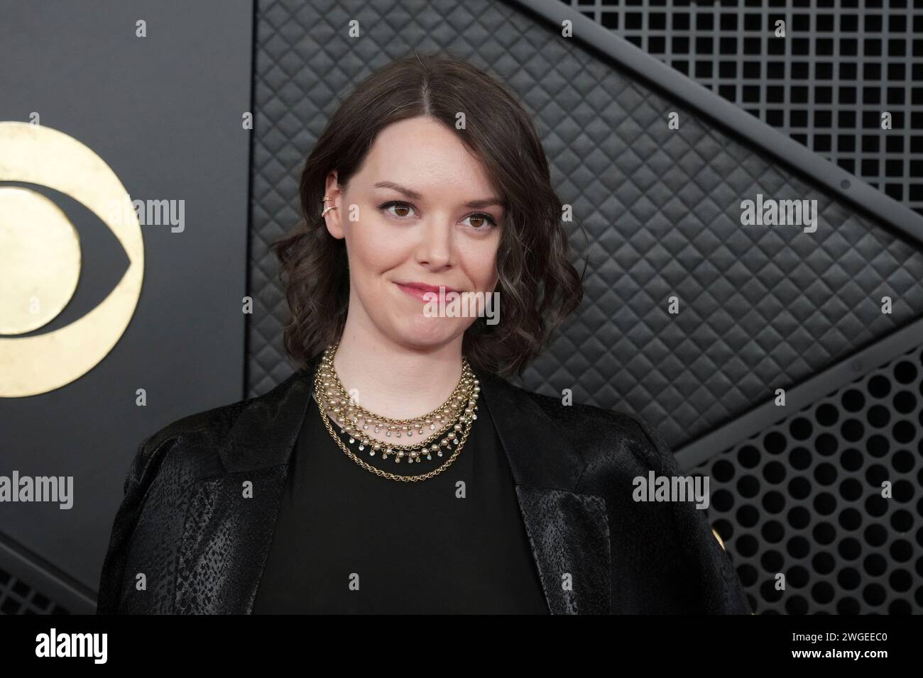 Rebecca Tomasko arrives at the 66th annual Grammy Awards on Sunday, Feb ...
