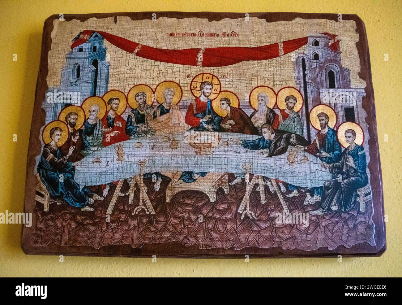Old painting with the Last Supper on a wooden canvas a symbol of faith ...