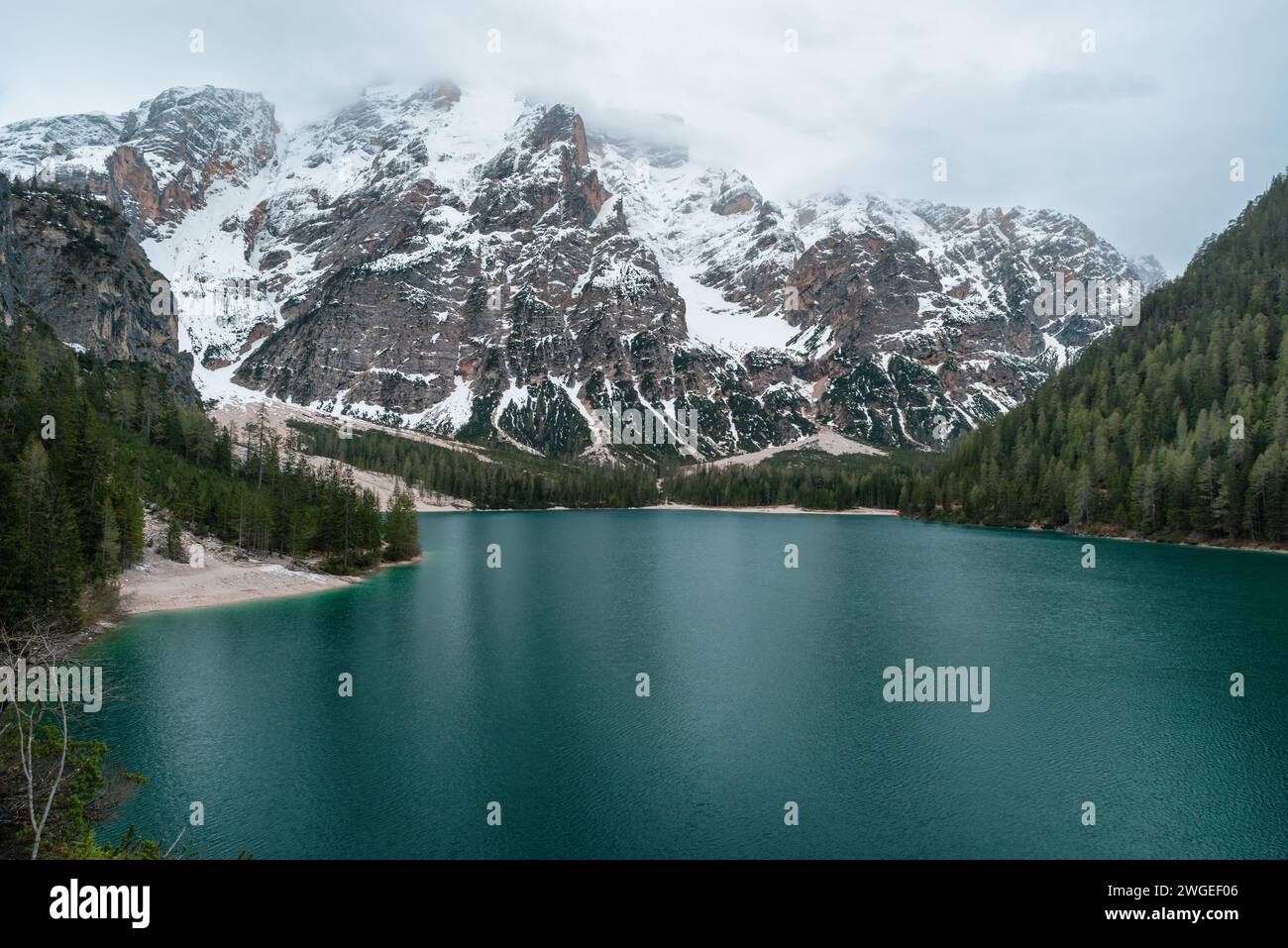 Aerial view of turquoise water alpine lake Lago di Braies in Dolomities ...