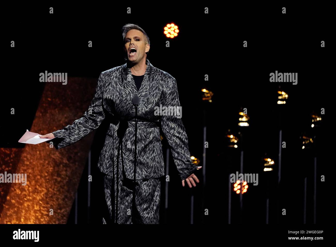 Presenter Justin Tranter appears on stage during the 66th annual Grammy ...