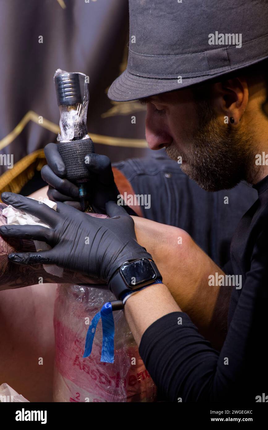 Paris, France. 2nd Feb, 2024. Tattoo artist, LeonKA (Spain) during the ...