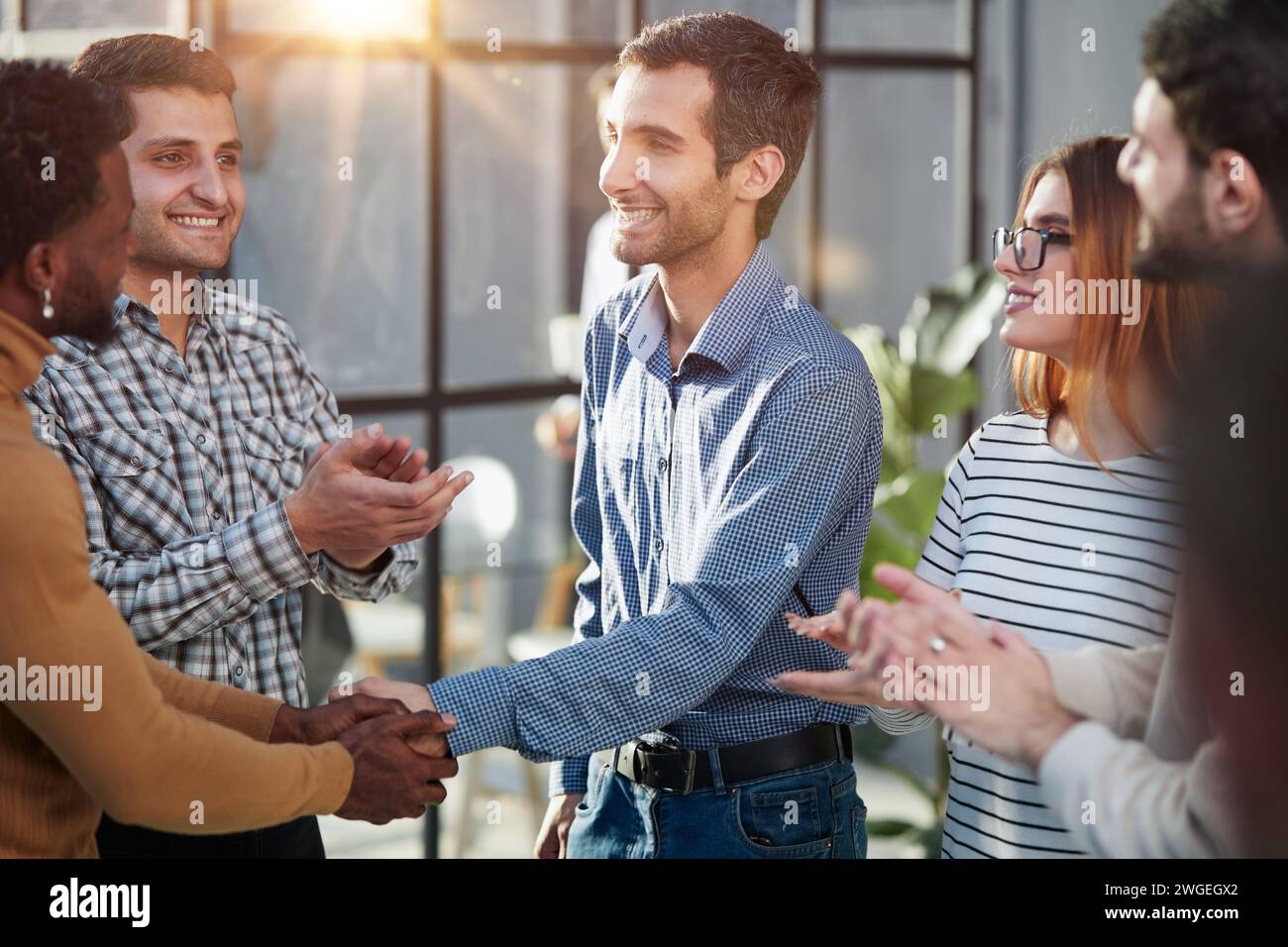 Standing greeting smiling achievement communication hi-res stock ...