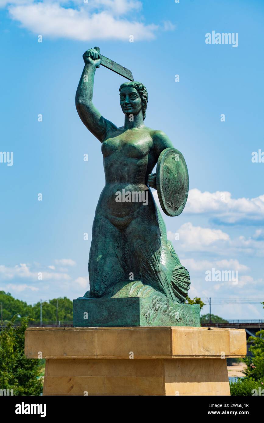 Statue of Syrenka, the Warsaw Mermaid, at Vistula River bank in Warsaw ...