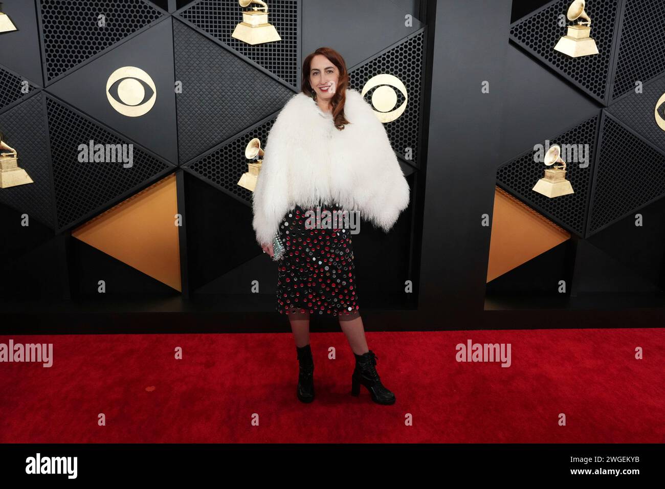 Caryn Capotosto arrives at the 66th annual Grammy Awards on Sunday, Feb ...