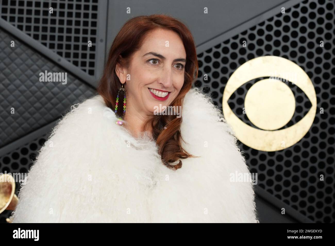 Caryn Capotosto arrives at the 66th annual Grammy Awards on Sunday, Feb ...