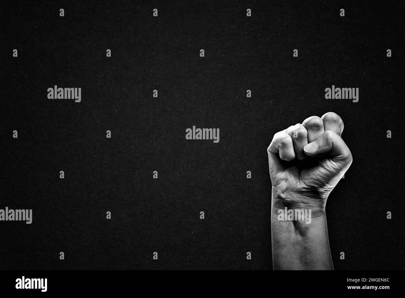 Raised Hand Clenched into Fist Symbol Gesture Sign in Black and White ...