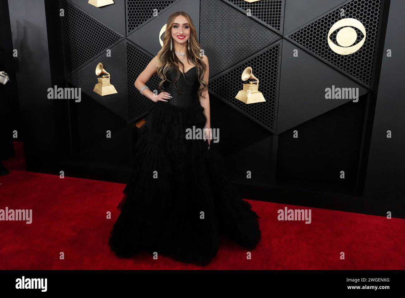 McKenzi Brooke arrives at the 66th annual Grammy Awards on Sunday, Feb ...
