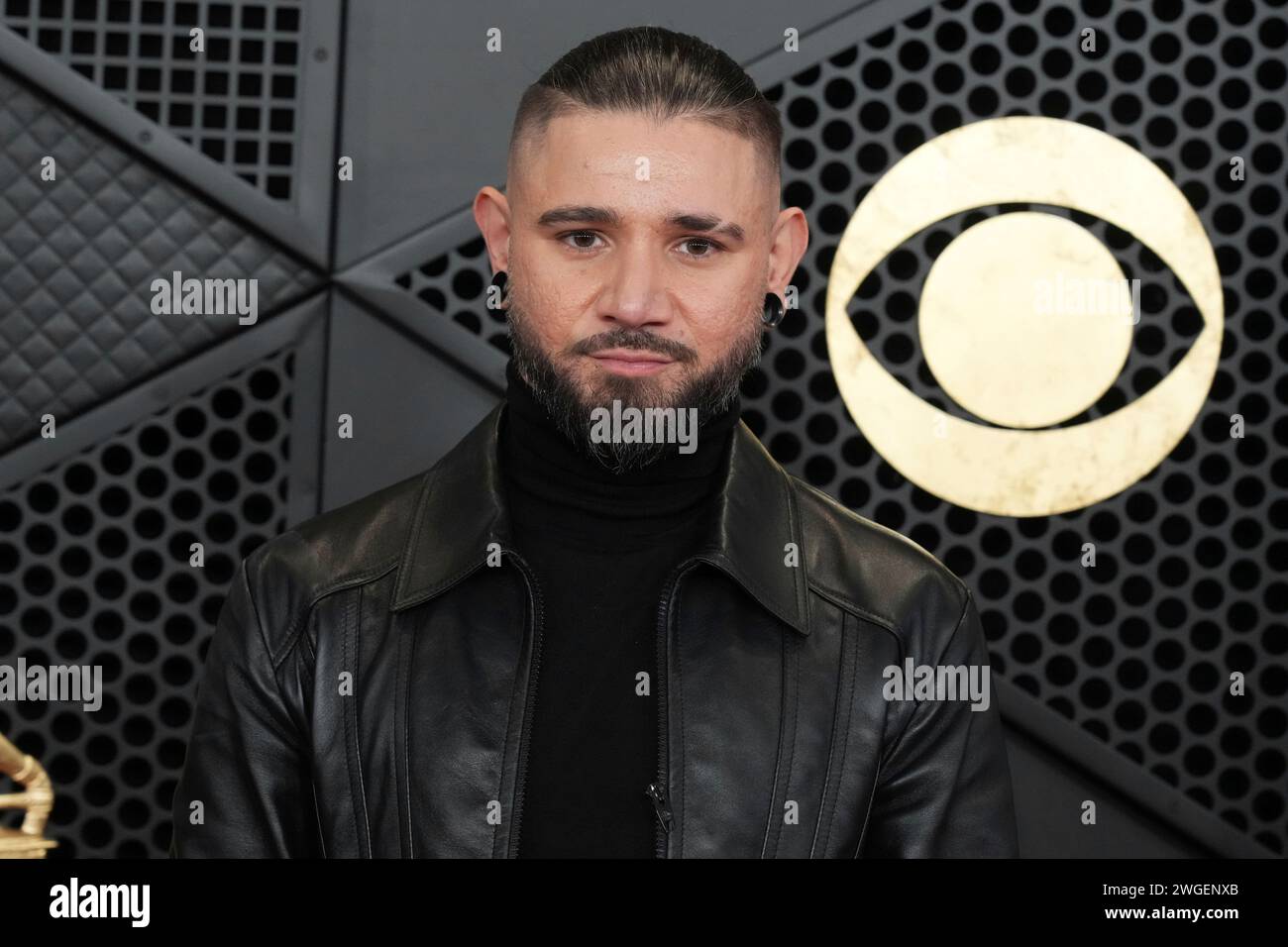 Skrillex arrives at the 66th annual Grammy Awards on Sunday, Feb. 4 ...