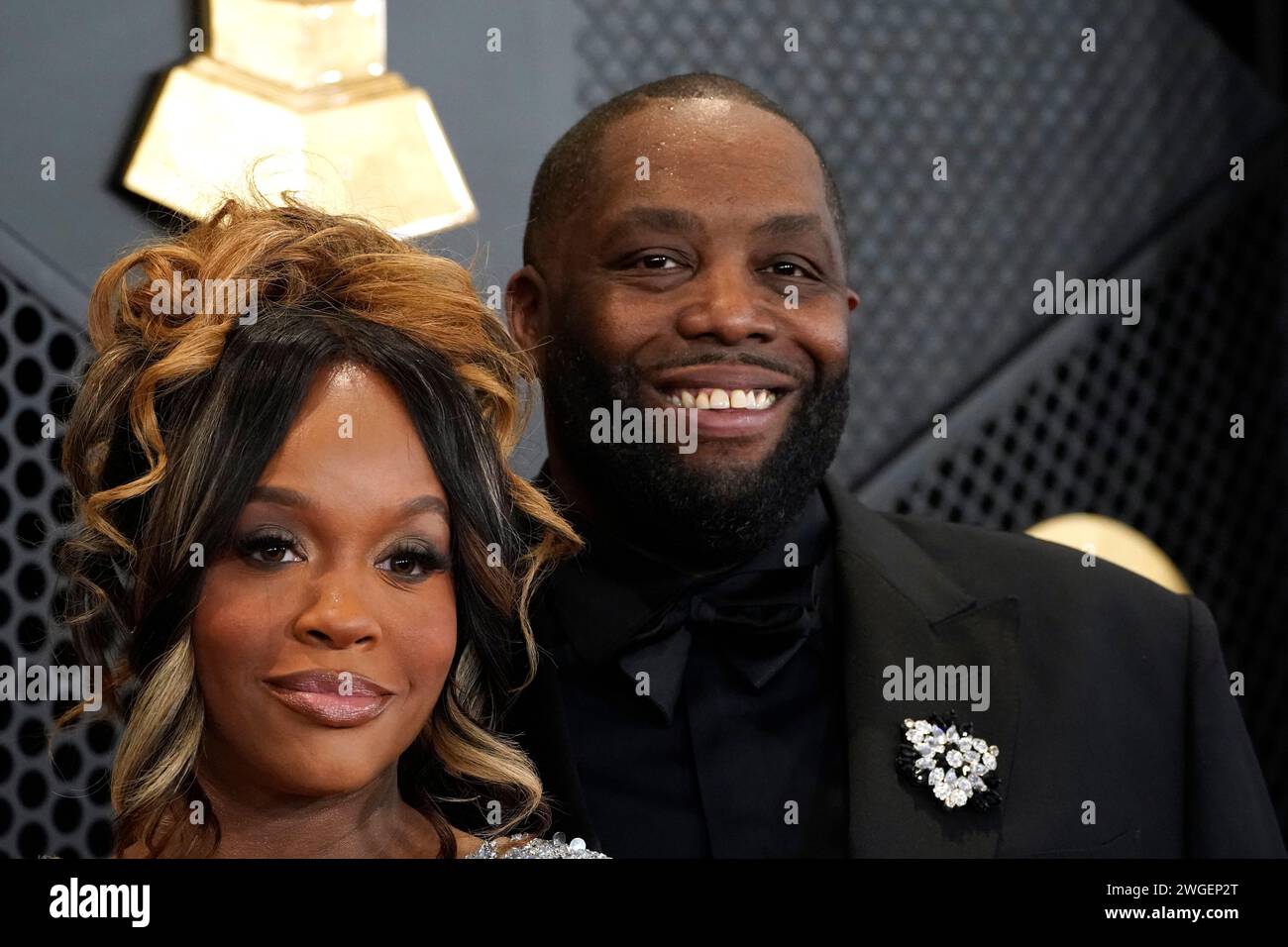 Shana Render, left, and Killer Mike arrive at the 66th annual Grammy ...