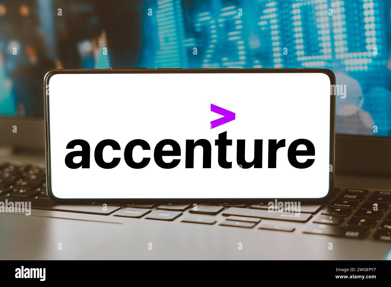 In this photo illustration, the Accenture logo is displayed on a ...