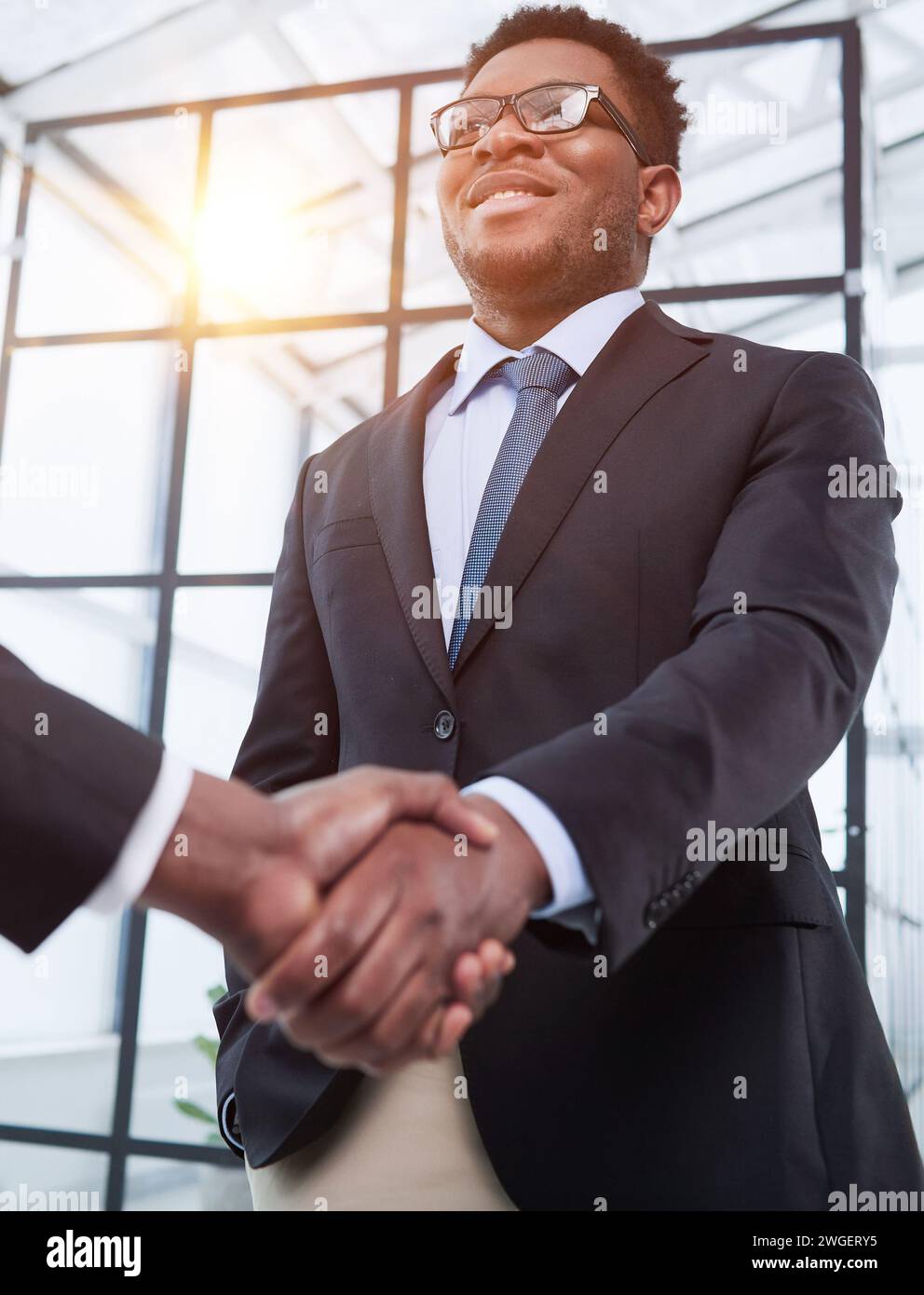 Two business men shaking hands together after successful meeting Stock ...