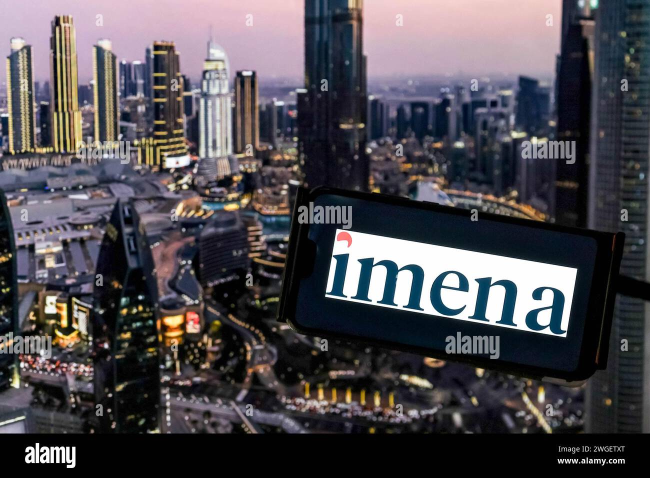 In this photo illustration, the Imena logo is seen on a smartphone ...