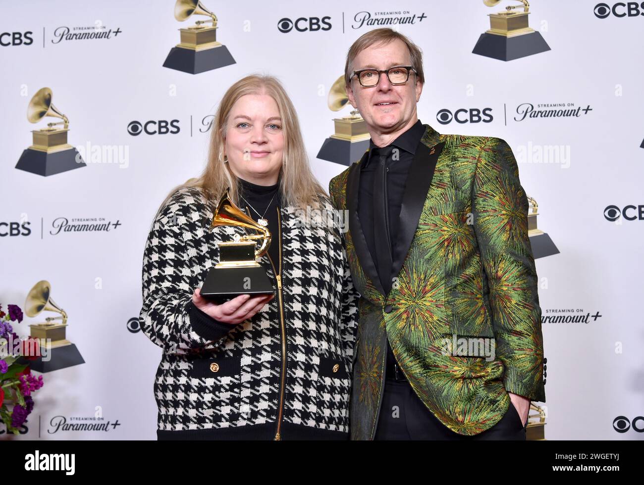 Ann Mincieli, left, and Michael Romanowski pose in the press room with ...
