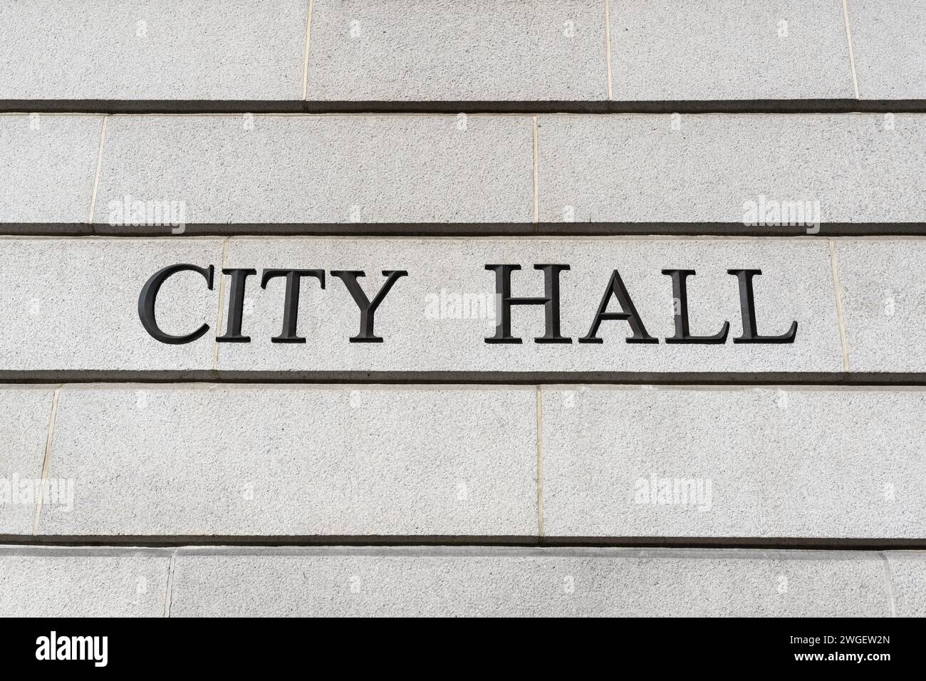 City hall sign on granite building wall in downtown Los Angeles ...