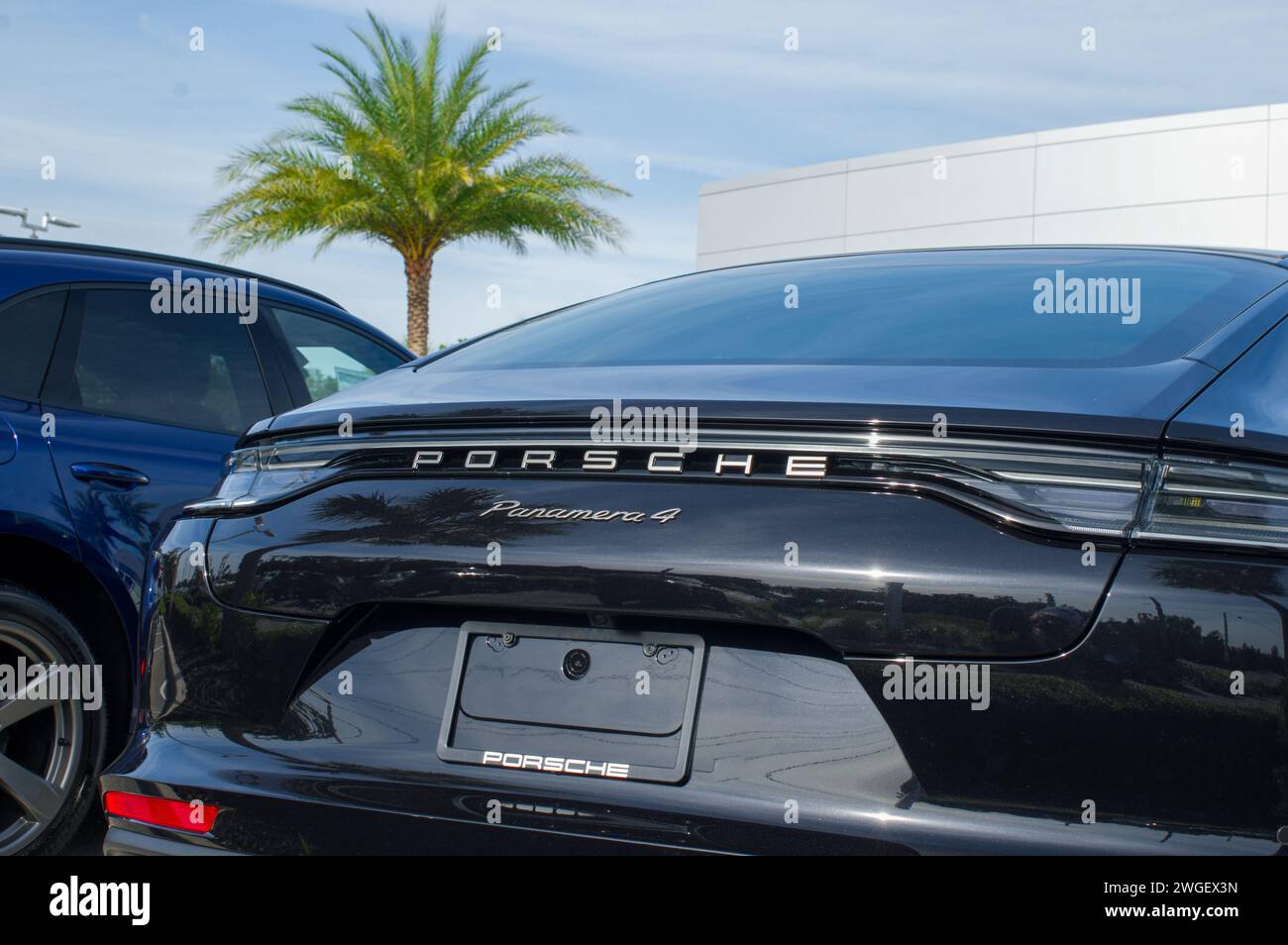 OCALA, FLORIDA USA - January 3, 2024 Porsche dealership with red logo ...