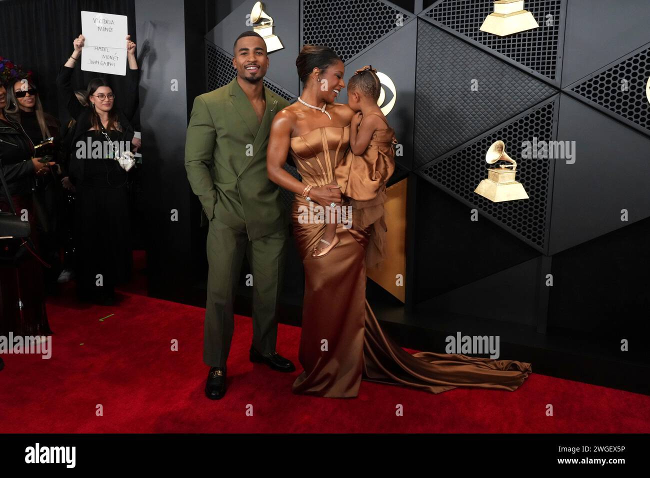 John Gaines, from left, Victoria Monet, and Hazel Monet Gaines arrive ...
