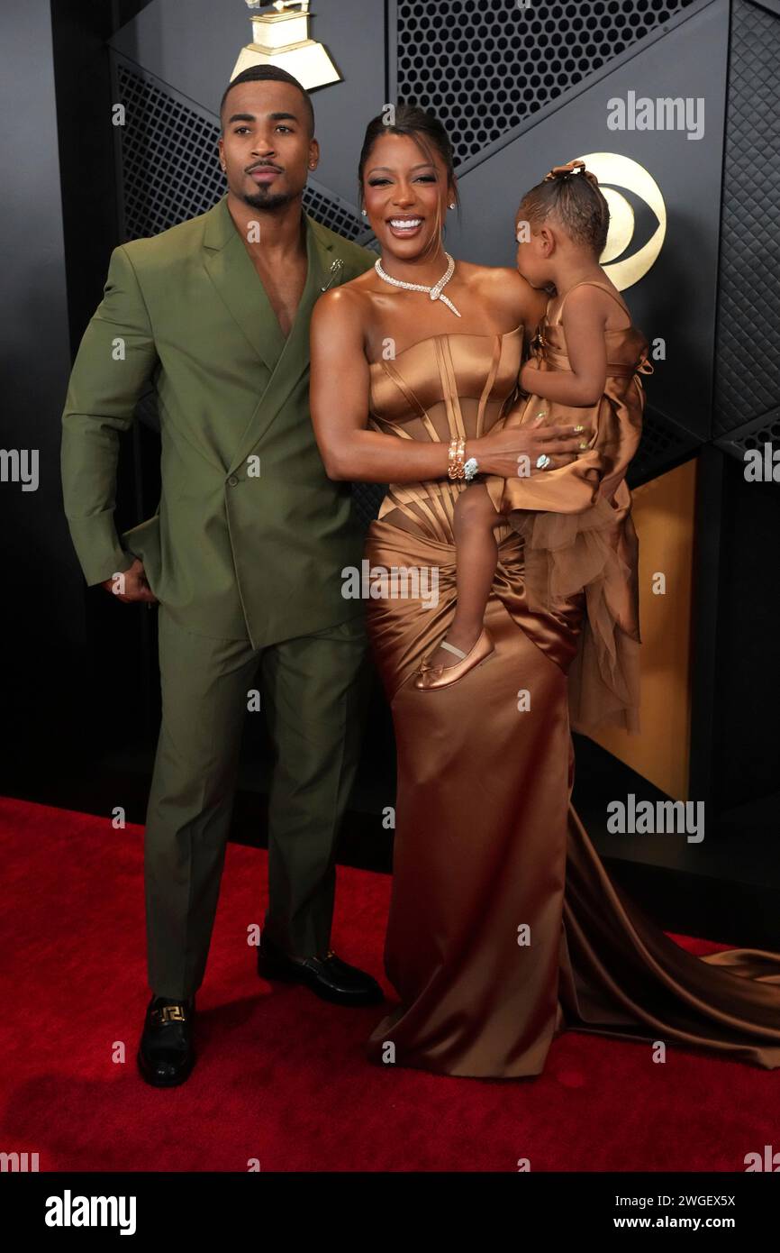 John Gaines, from left, Victoria Monet, and Hazel Monet Gaines arrive ...