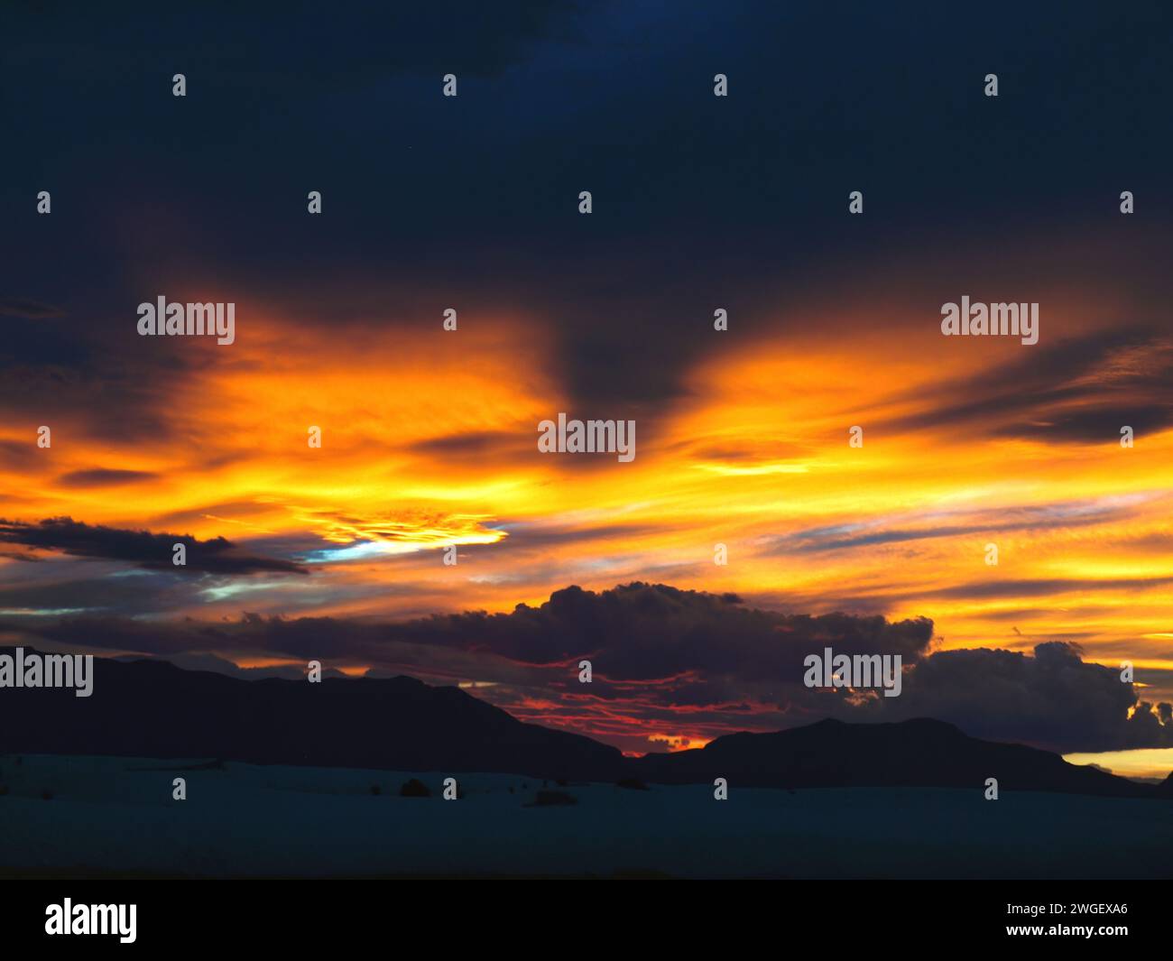Dark sand dunes and sunset Stock Photo - Alamy