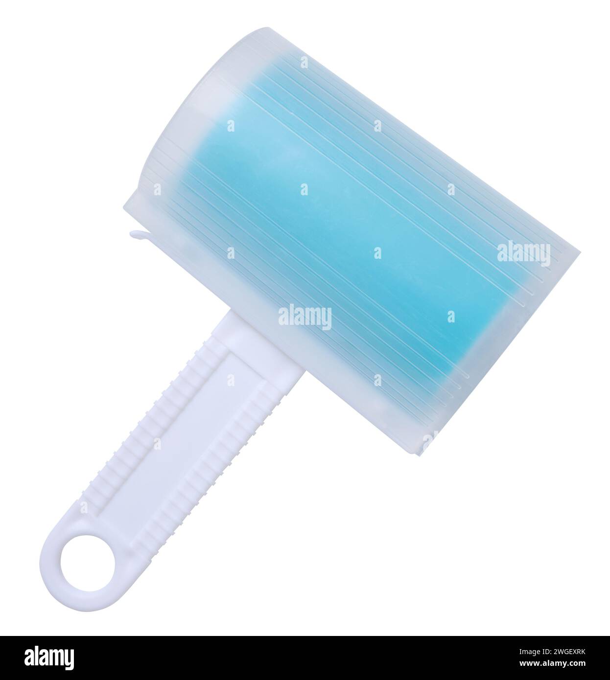Roller with sticky tape for cleaning clothes on a white background, top ...