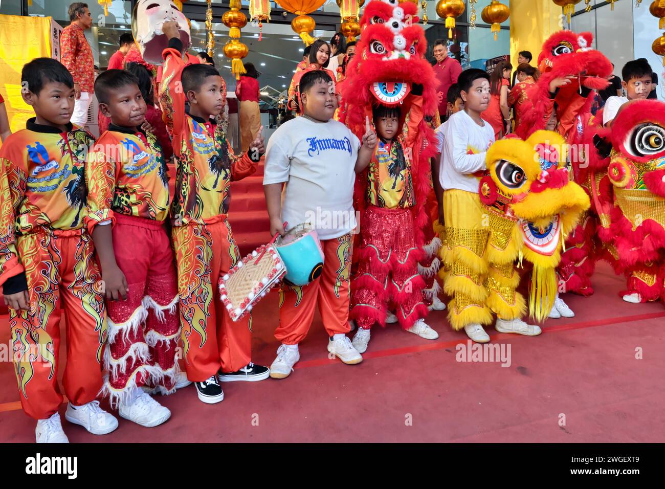 Young Thai boys dressed up in their colorful Lion Dance outfits for ...