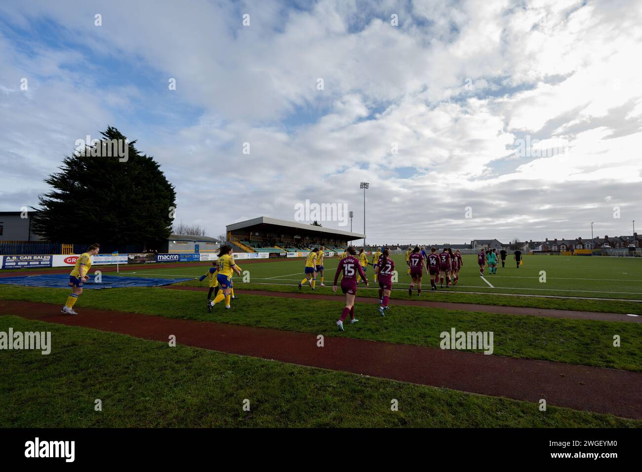 Barry, UK. 4th February 2024. Players take to the pitch during the ...