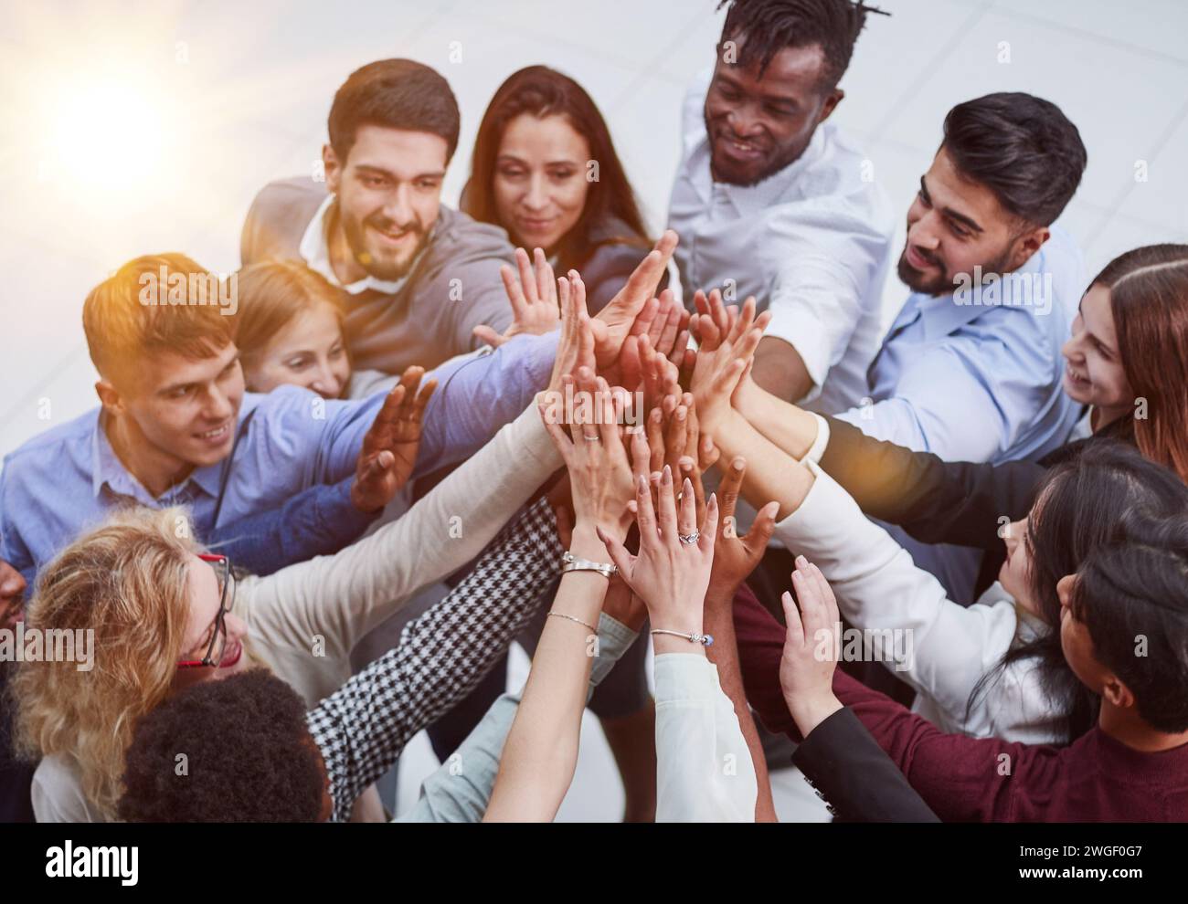 People of different ethnicities uniting to cooperate together Stock ...