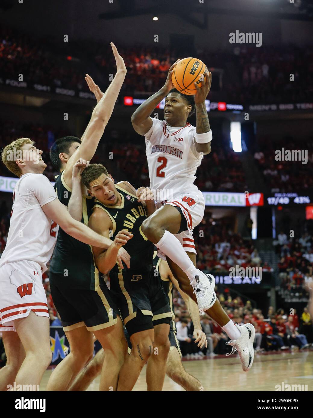 Madison, WI, USA. 4th Feb, 2024. Wisconsin Badgers guard AJ Storr (2) goes in for a layup during ...