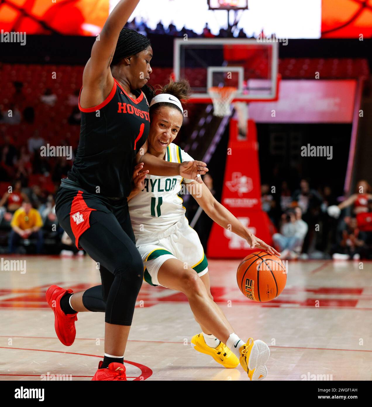 February 4, 2024: Baylor guard Jada Walker (11) moves the ball against Houston forward Bria ...