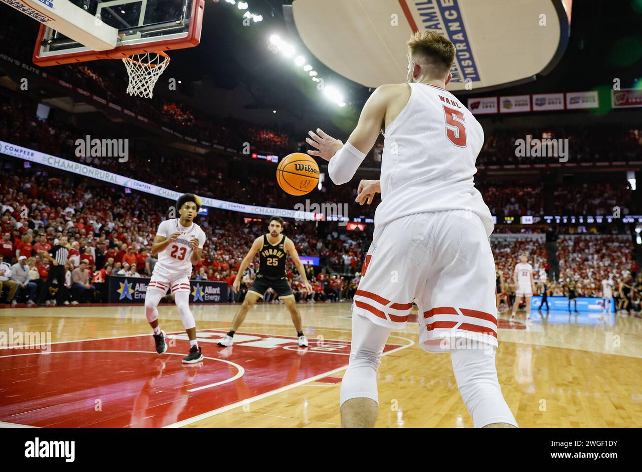 Madison, WI, USA. 4th Feb, 2024. Wisconsin Badgers forward Tyler Wahl (5) inbounds the ball to ...