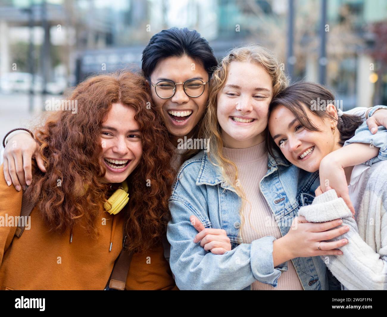 Group happy smiling young hi-res stock photography and images - Alamy