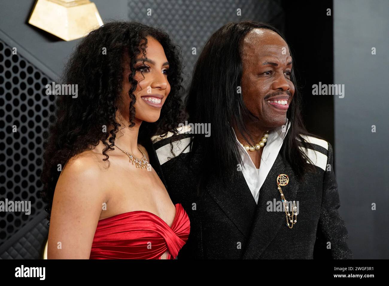Reina Nai, left, and Verdine White arrive at the 66th annual Grammy ...