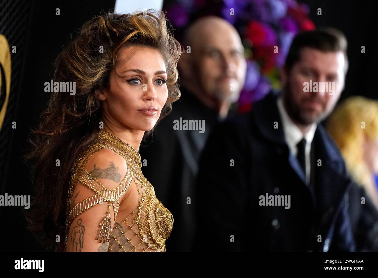 Miley Cyrus arrives at the 66th annual Grammy Awards on Sunday, Feb. 4 ...