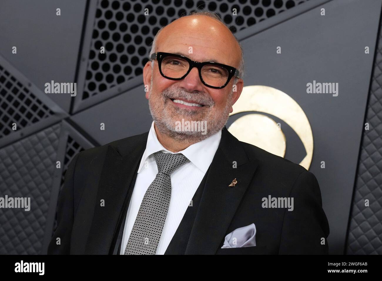 Manuel Abud arrives at the 66th annual Grammy Awards on Sunday, Feb. 4 ...