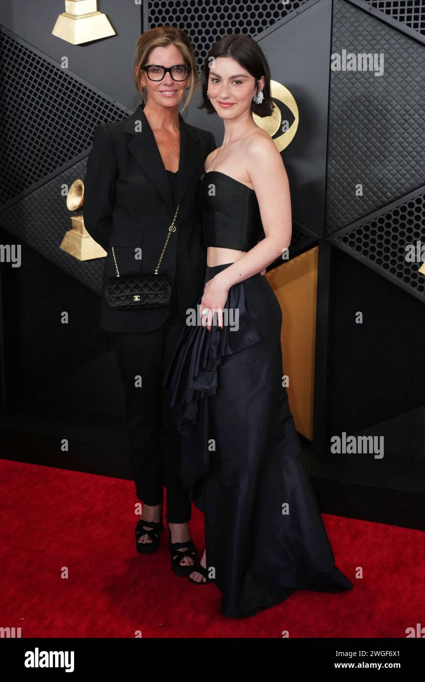 Katie McGrath, left, and Gracie Abrams arrive at the 66th annual Grammy ...