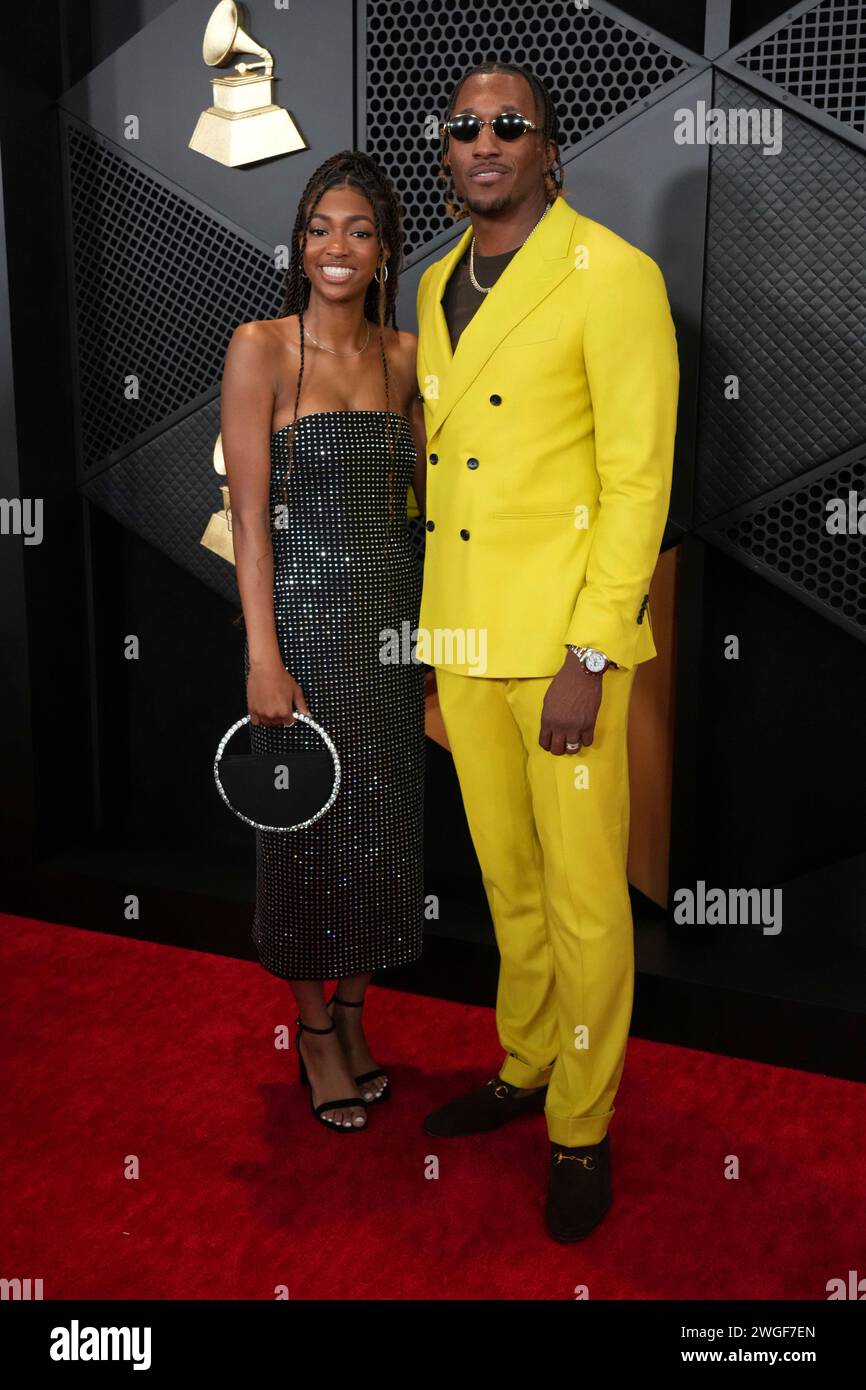 Amaya Moore, left, and Lecrae arrive at the 66th annual Grammy Awards ...